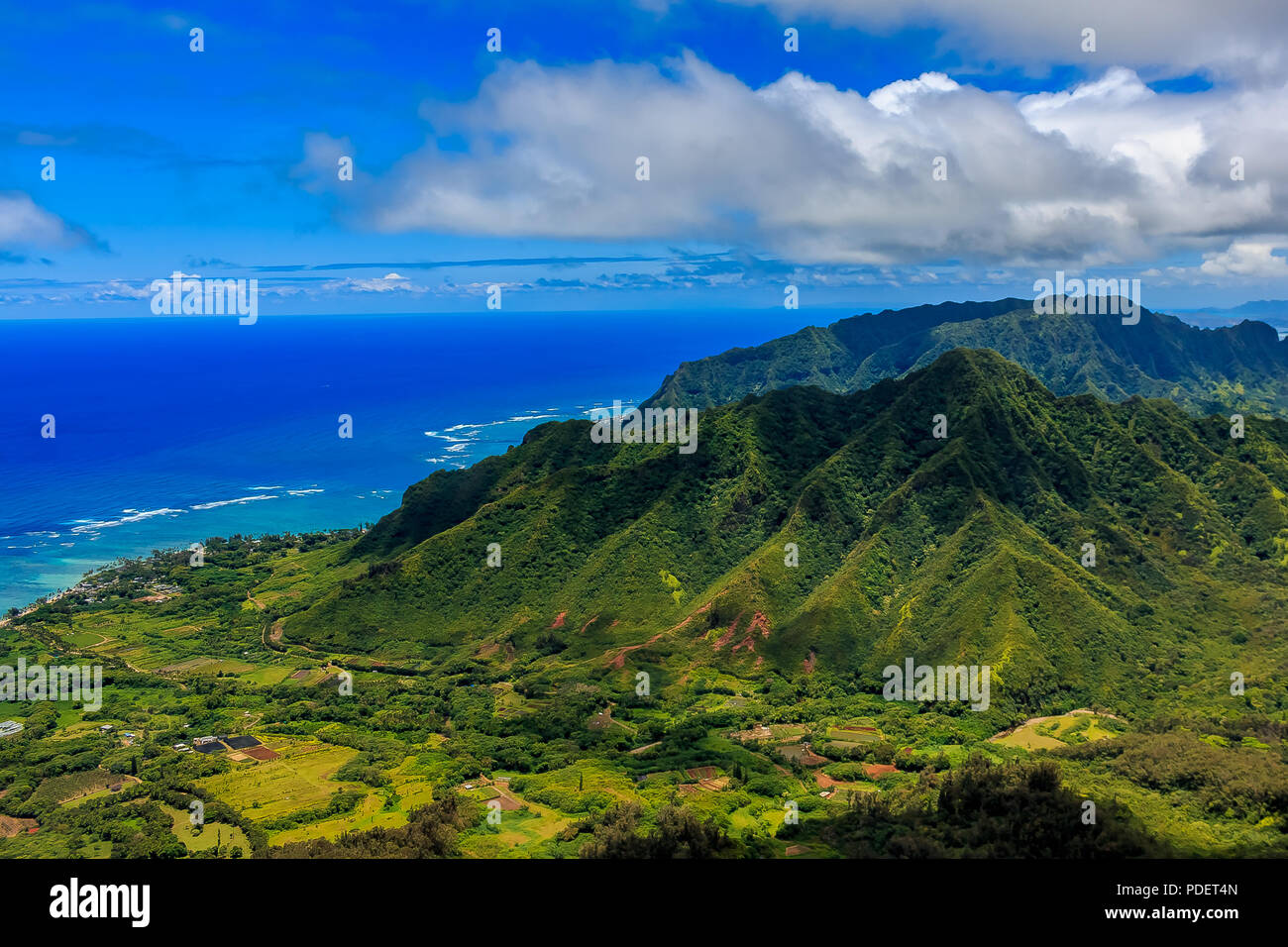 Aerial view Oahu coastline and mountains in Honolulu Hawaii from a ...