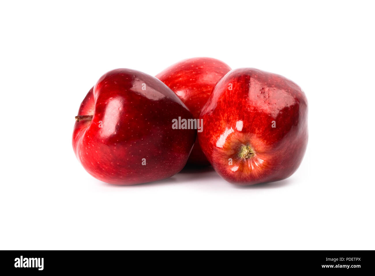 three red apples isolated on white background Stock Photo - Alamy