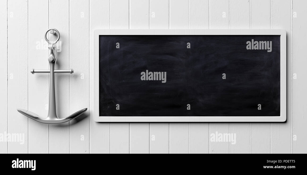 Marine concept. Metal ship anchor and blank blackboard on white wooden ...