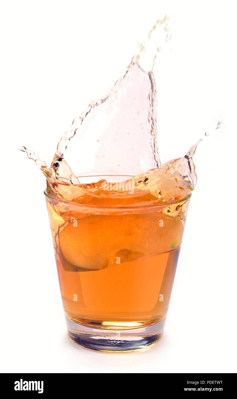 apple juice splash on a white background Stock Photo - Alamy