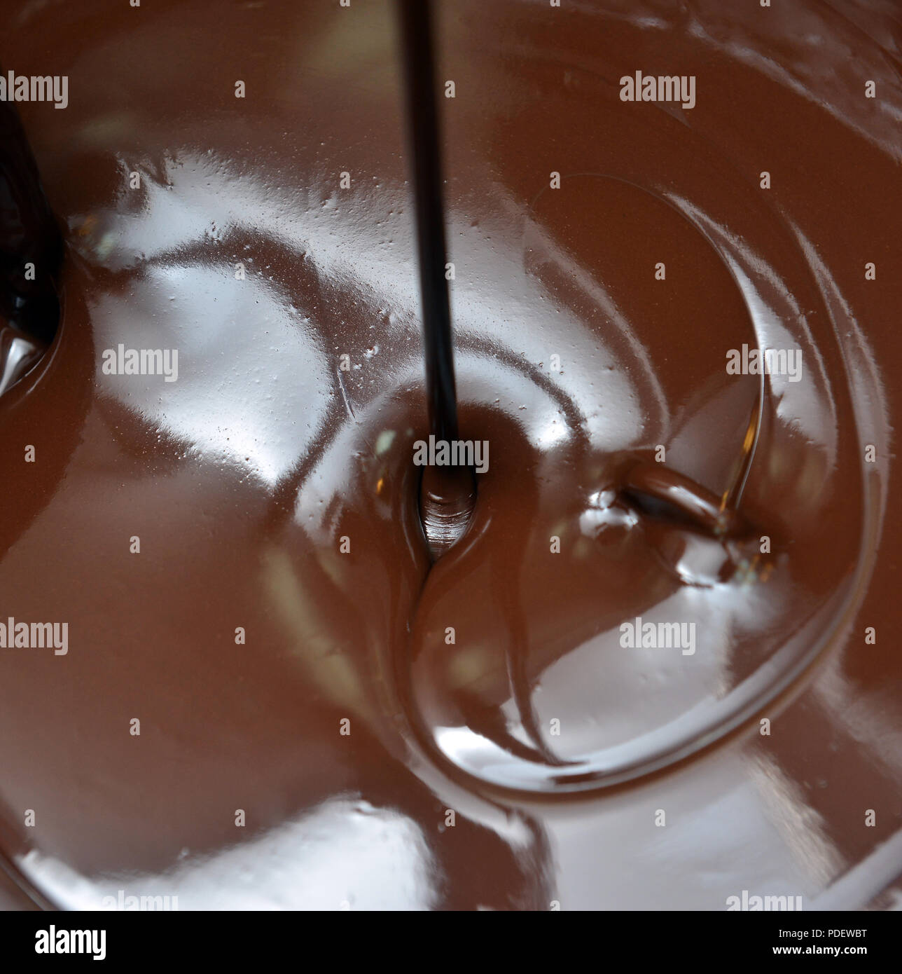 lots of chocolate falling from above Stock Photo - Alamy