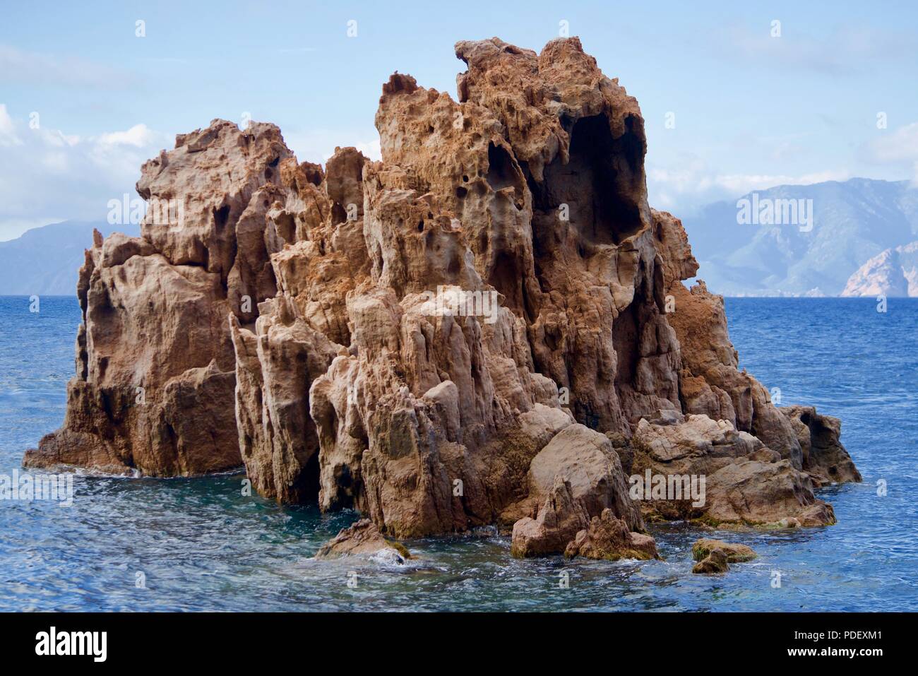 Wild rock formation in the ocean Stock Photo - Alamy