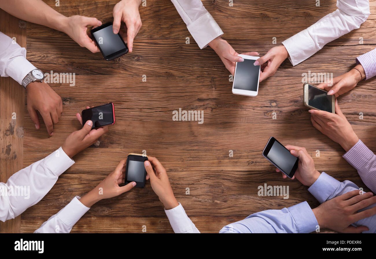 Large group of people and cell phones hi-res stock photography and ...