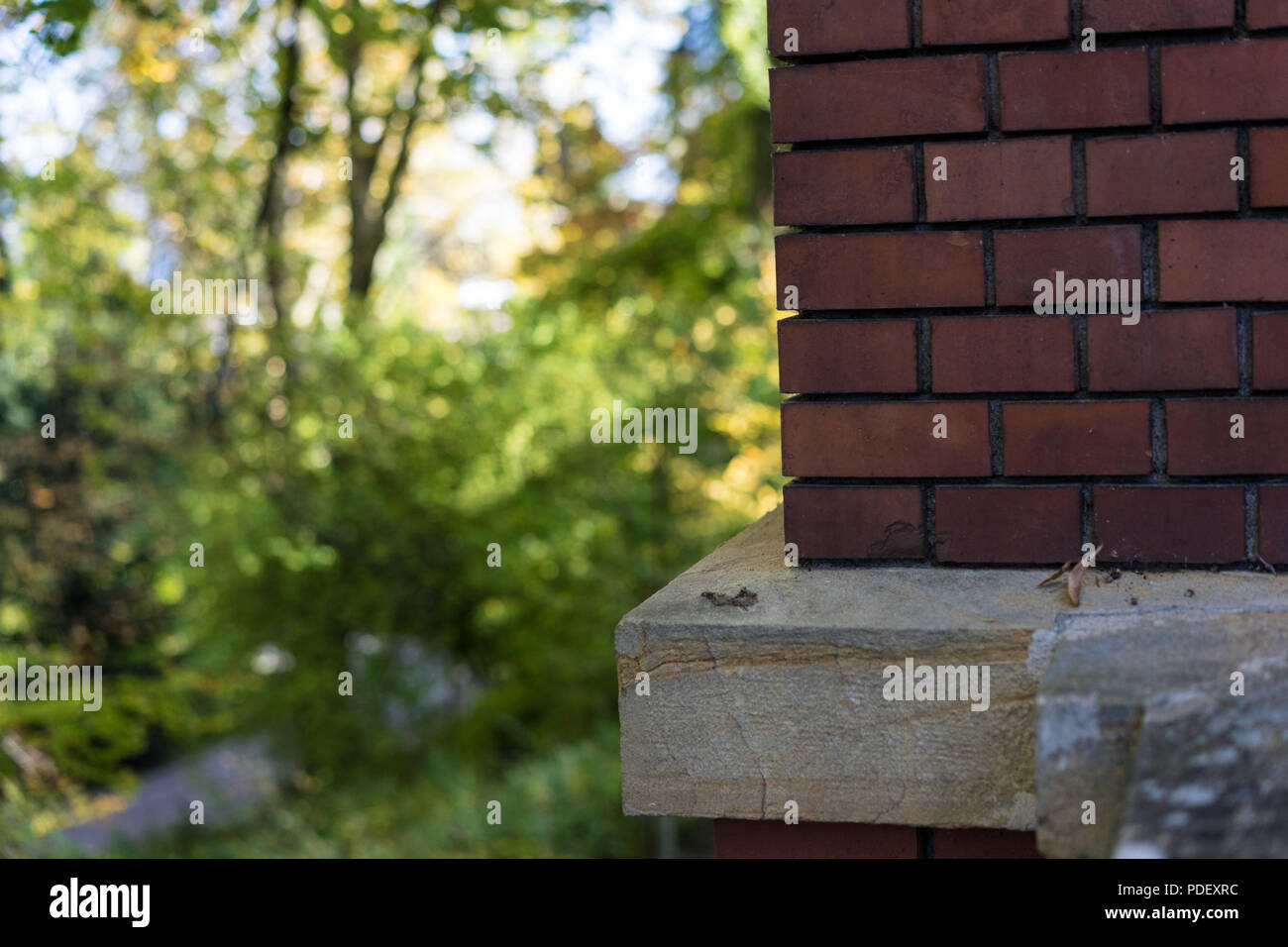 red brick wall house corner with garden view architecture Stock Photo ...