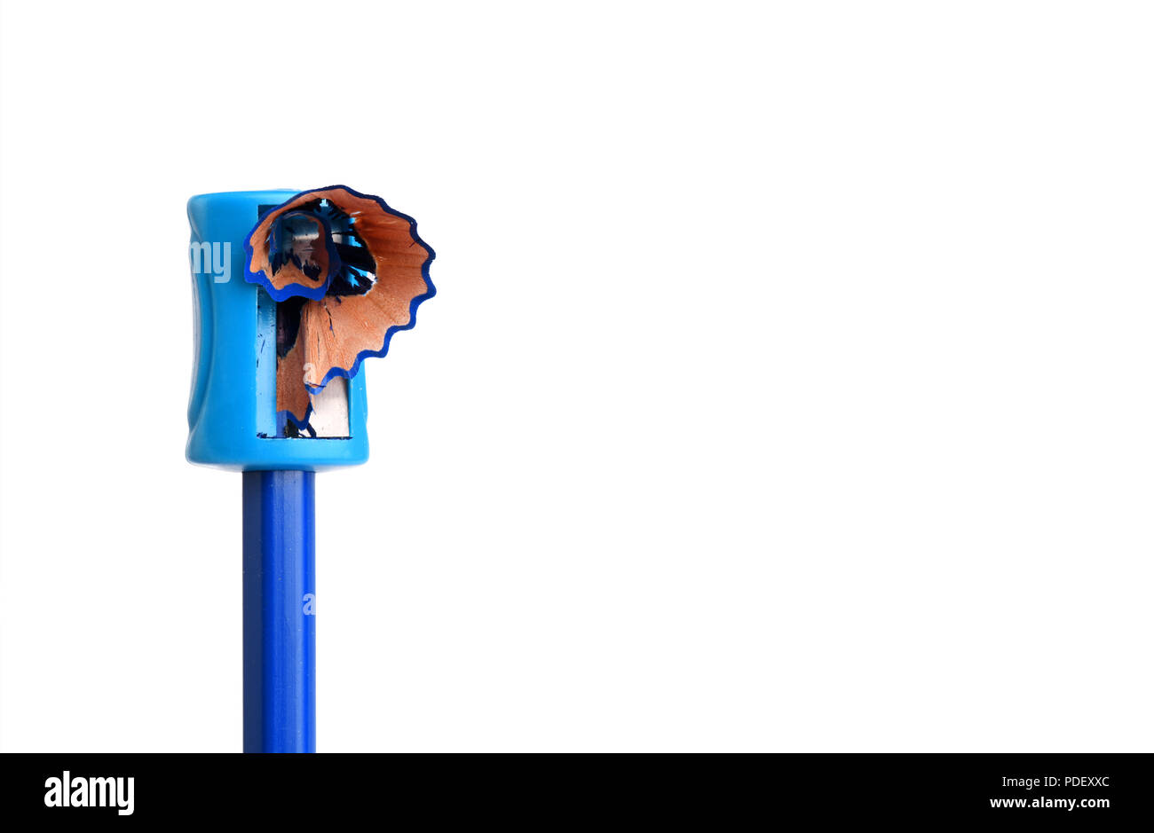 Blue colored pencil sharpened with a manual sharpener Stock Photo - Alamy