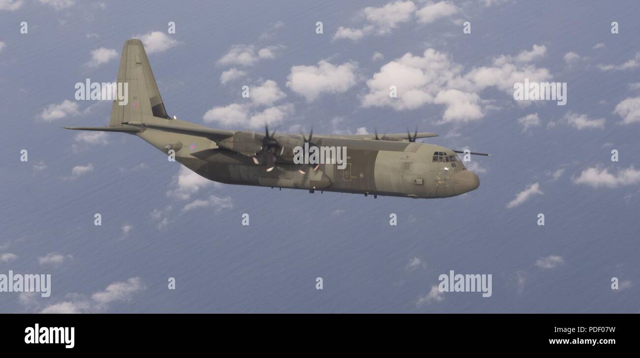 A Royal Air Force C-130 Hercules flies, over England, during the RAF ...