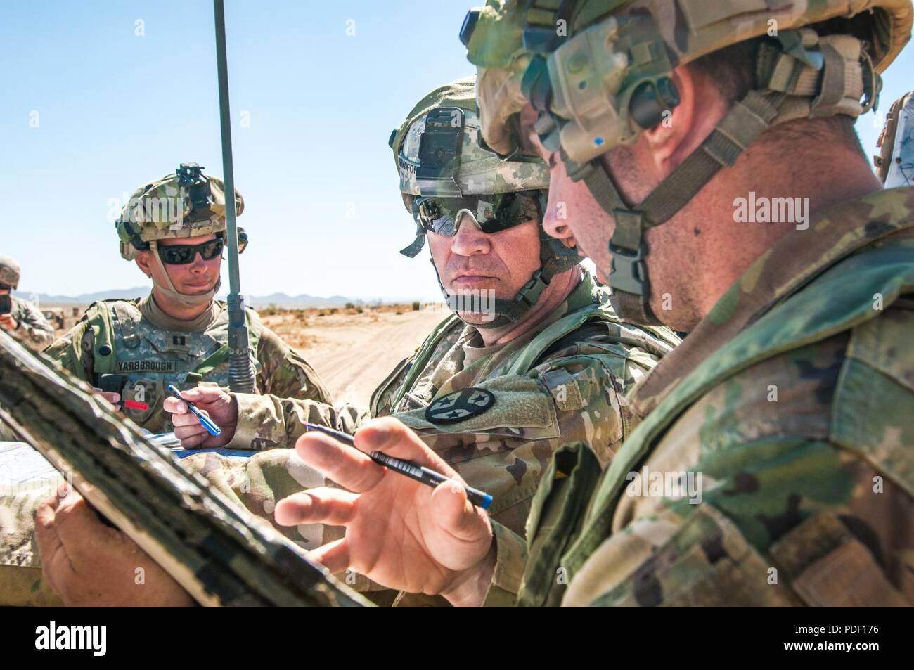 U.S. Army Maj. Brad Bradford and U.S. Army Cpt. Kyle Farley, troop ...