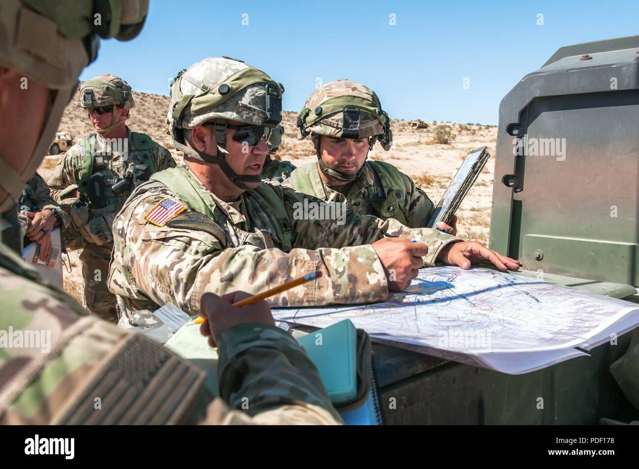 U.S. Army Maj. Brad Bradford and U.S. Army Cpt. Kyle Farley, troop ...