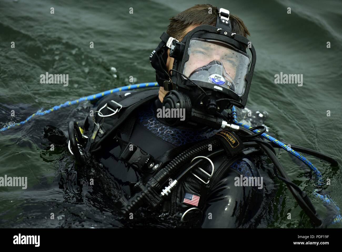 Petty Officer 2nd Class William Pettit, a Coast Guard diver from ...
