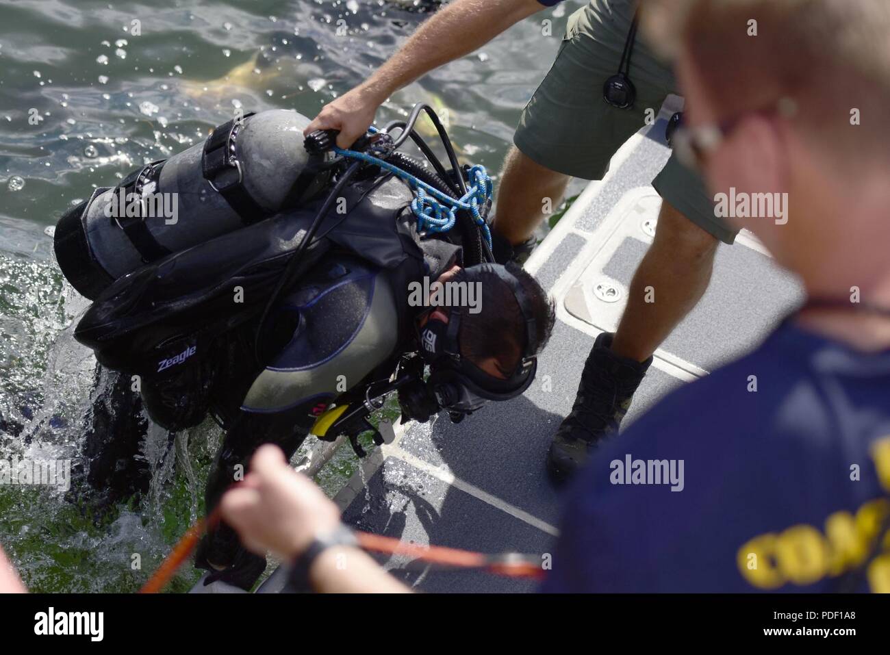 Petty Officer 1st Class Brendon Ballard, a Coast Guard diver from ...