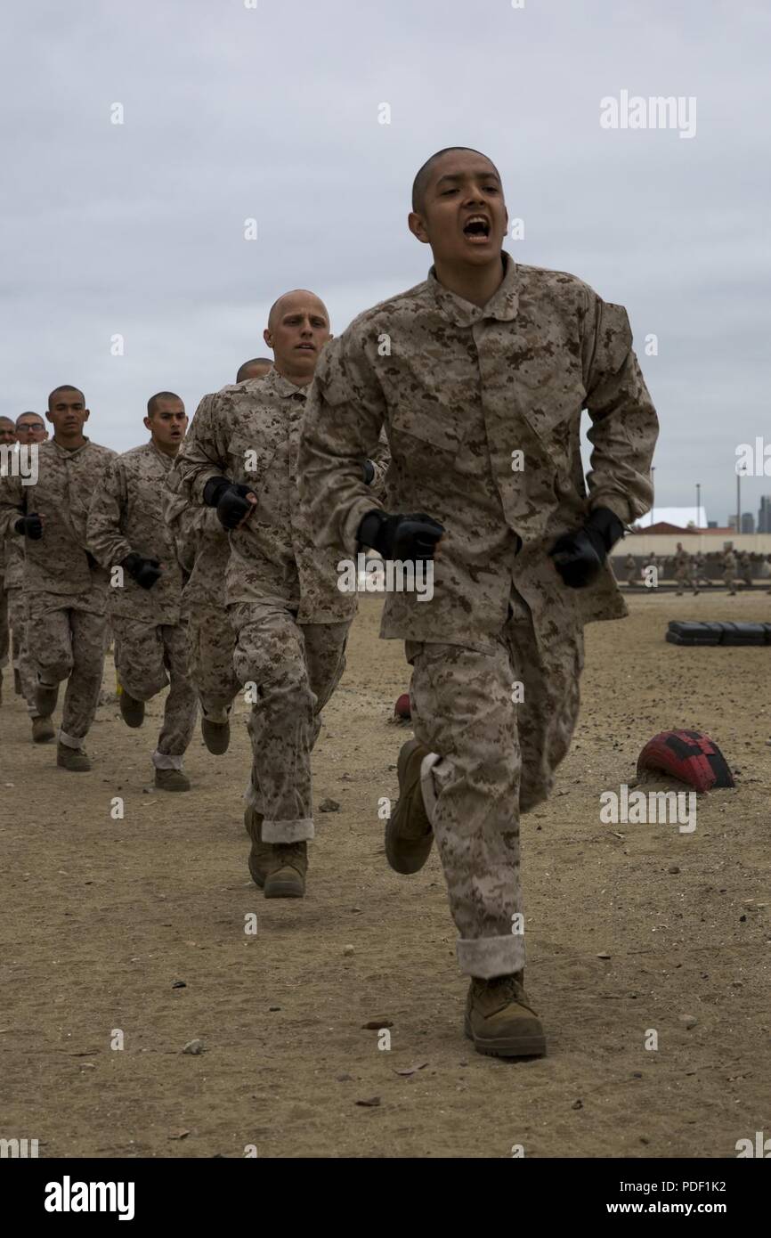 Recruits with Kilo Company, 3rd Recruit Training Battalion, run during ...