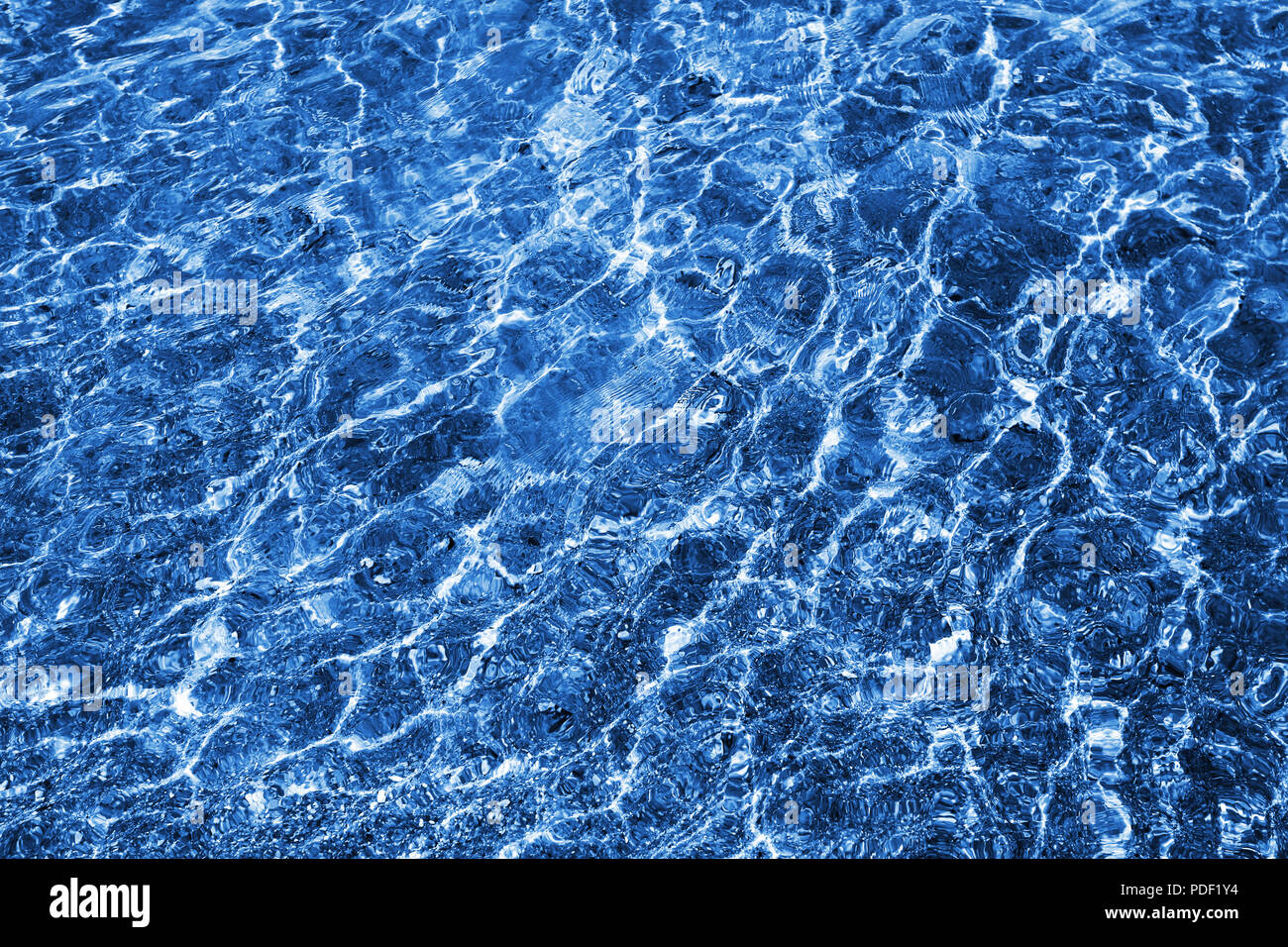 Photo of a macro bubbling blue clear sea water Stock Photo - Alamy