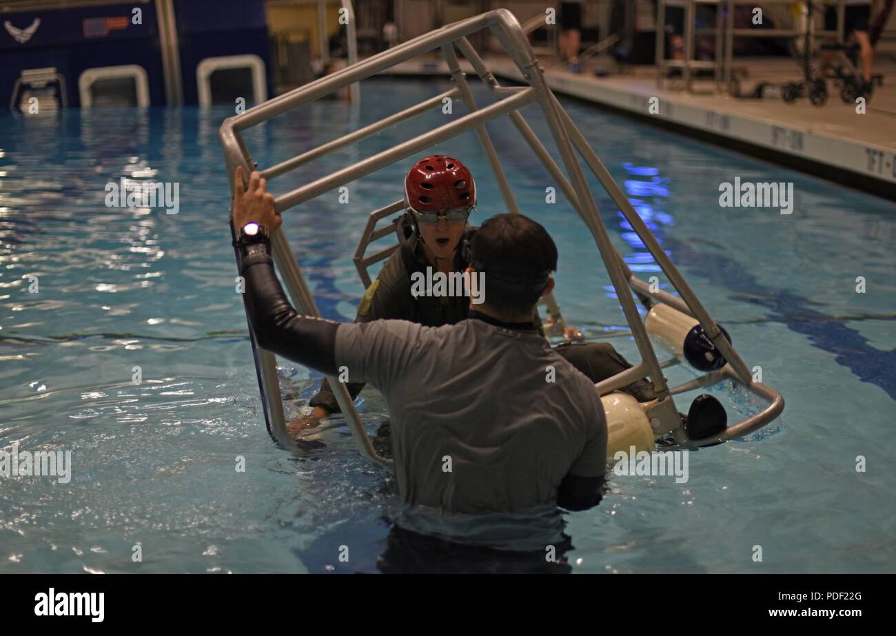Nicole A. Mann, NASA astronaut, prepares to be flipped upside down by ...