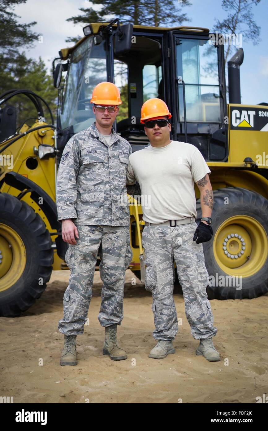 Airmen from the 134th Civil Engineering Squadron construct concrete ...
