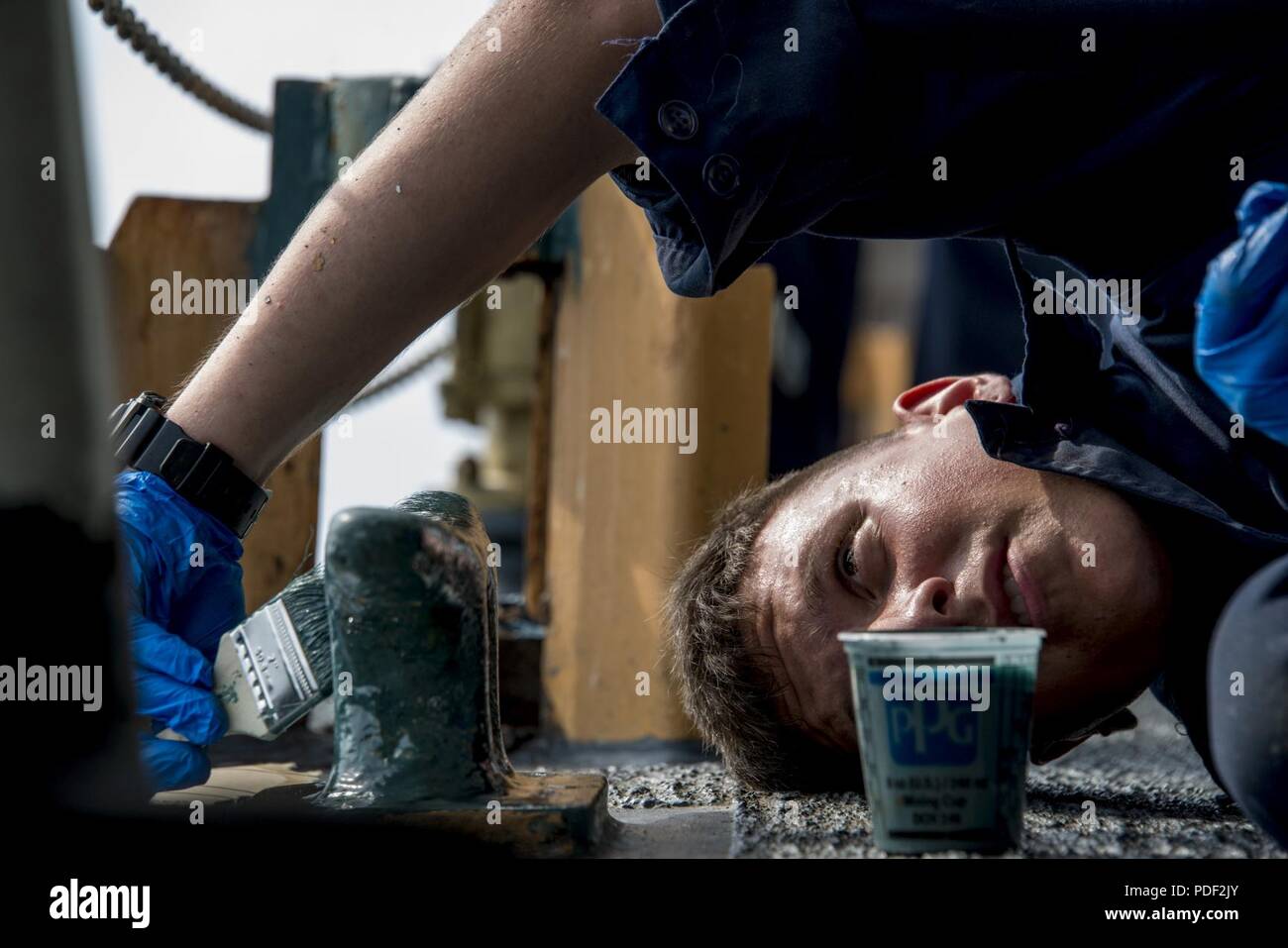 Seaman Eric Jackson, deck crewmember aboard the Coast Guard Cutter ...