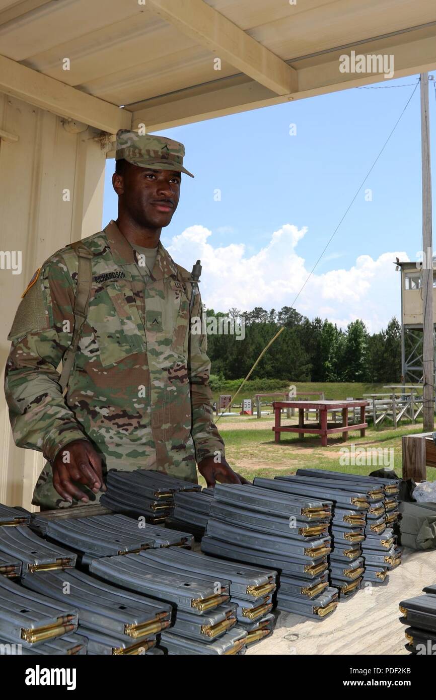 U.S. Army Pvt. Charles E. Richardson of Decatur, Ga., a radio ...