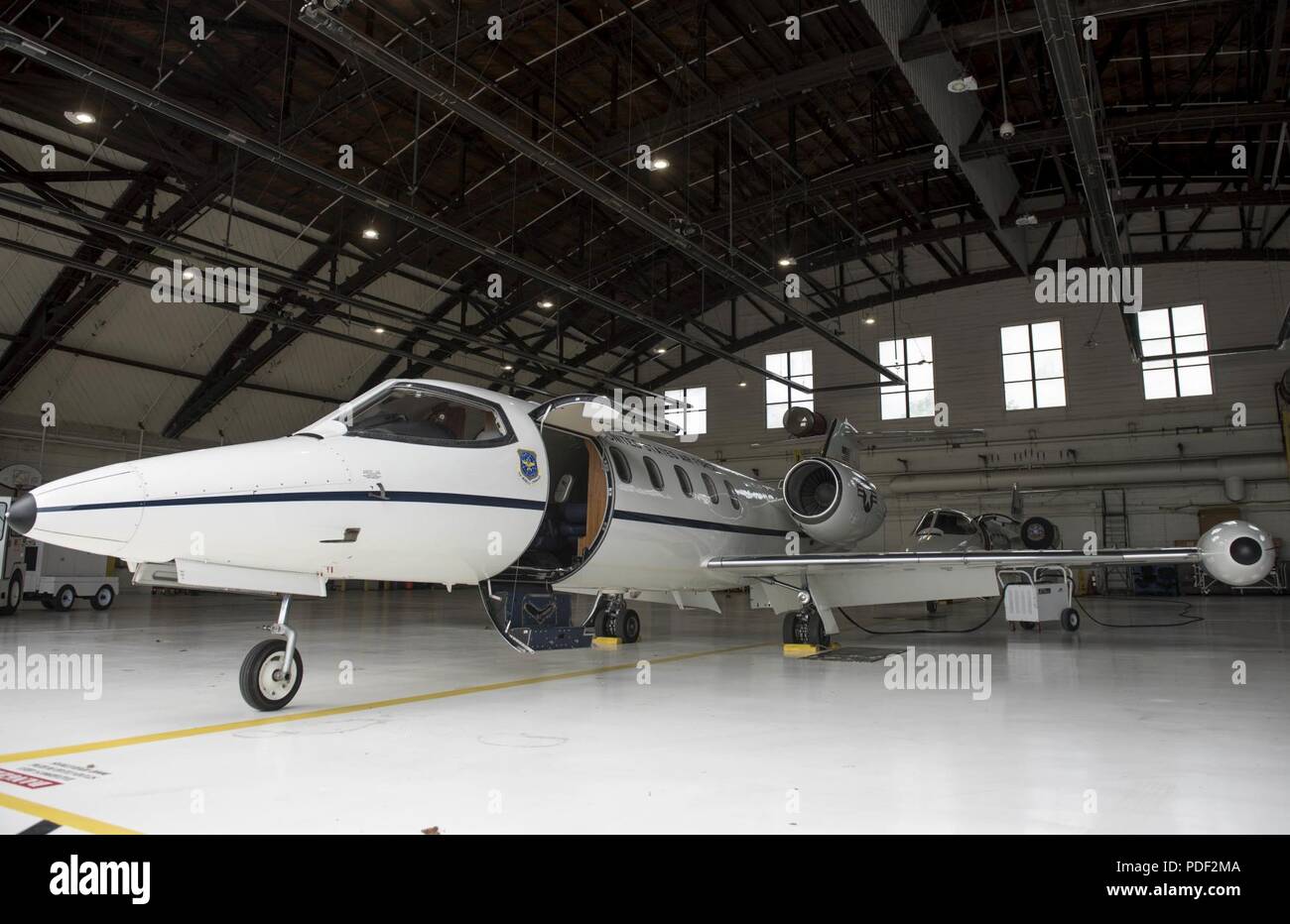 The 458th Airlift Squadron houses a C-21 aircraft in Hangar 3, May 18 ...