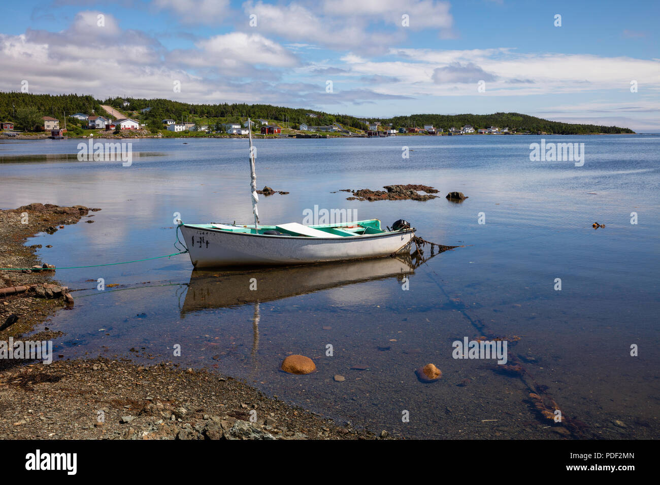 Boat reflection, Stag Harbour, Fogo Island, Newfoundland, Canada Stock ...