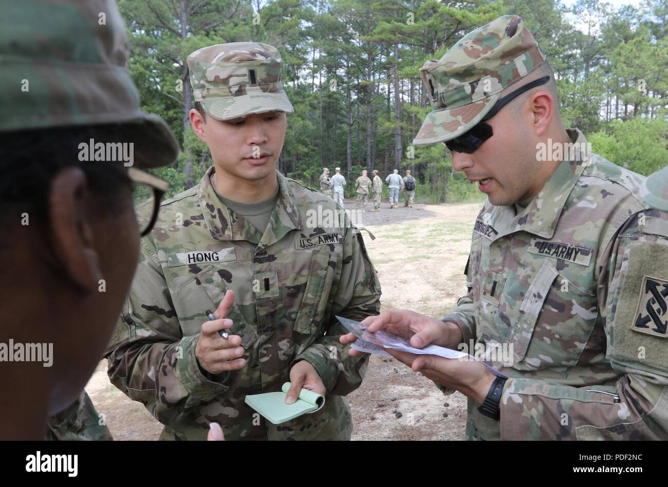 From left, U.S. Army 1st Lt. Eric H. Hong of Atlanta, and 1st Lt ...