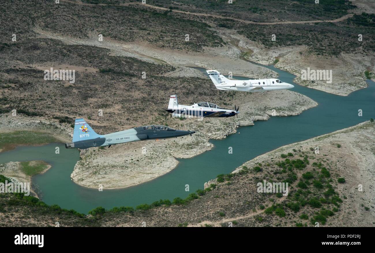 A T-1 Jayhawk, T-6 Texan II, and T-38 Talon fly in a dissimilar ...