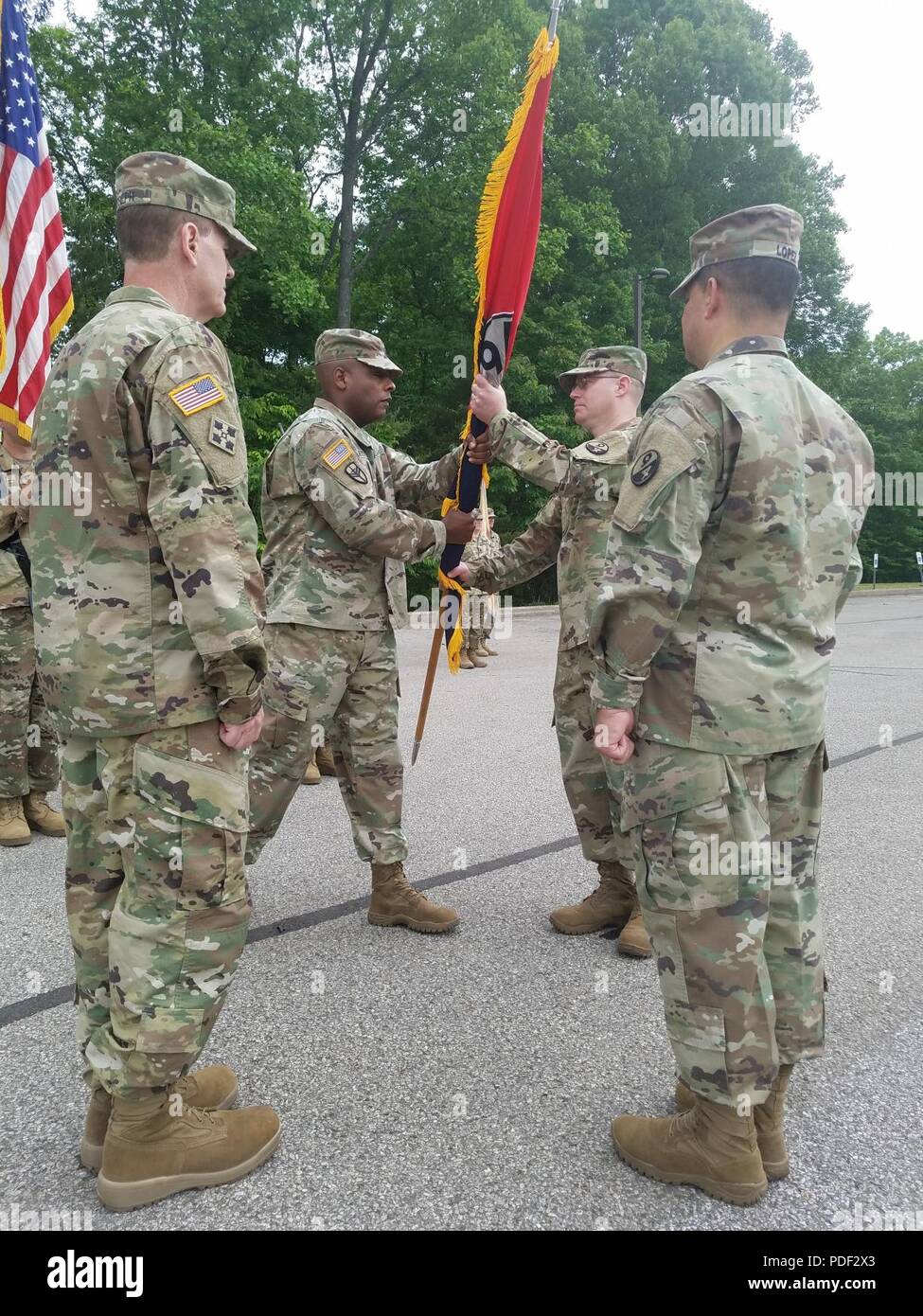 Col. John Dreska, outgoing 1st Brigade commander (right), passes the ...