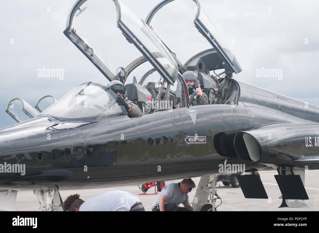 Several 192nd Fighter Wing Airmen ride in the back seat of a T-38 Talon ...