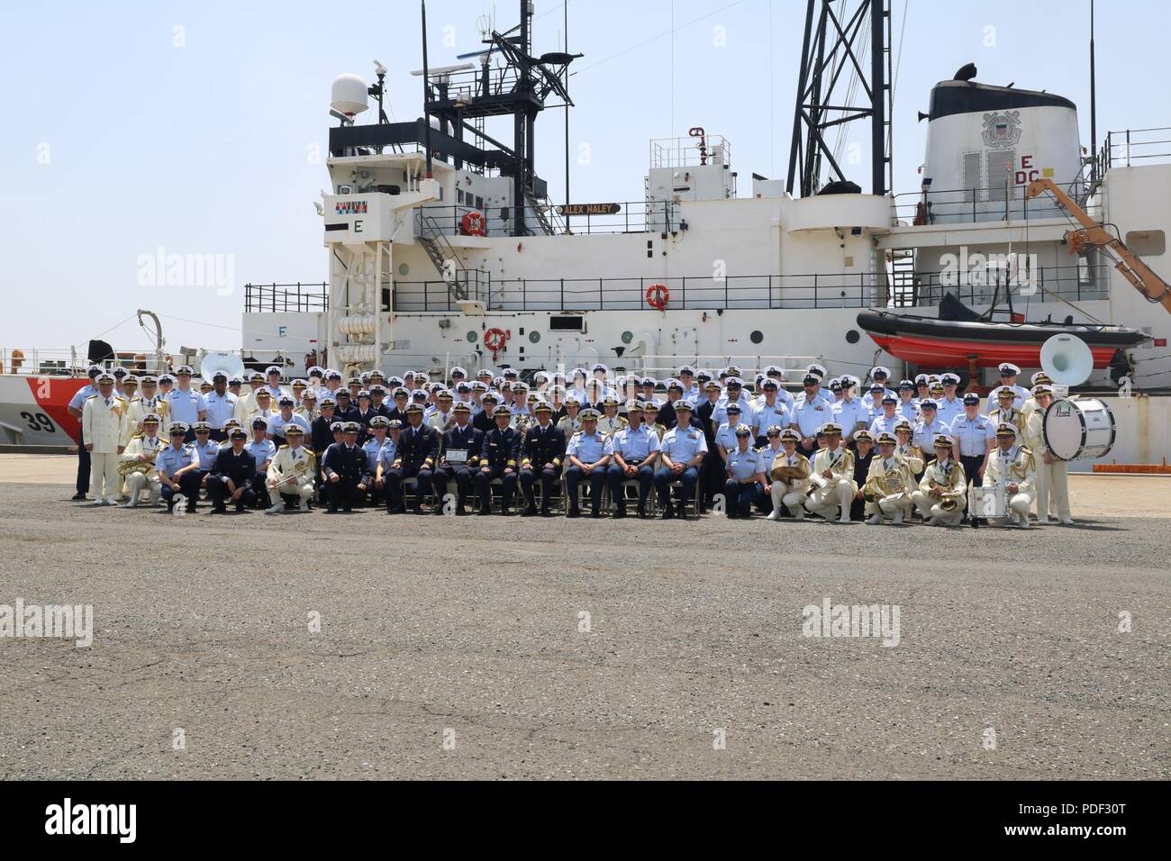 The crew of the Coast Guard Cutter Alex Haley (WMEC 39) and the Coast ...