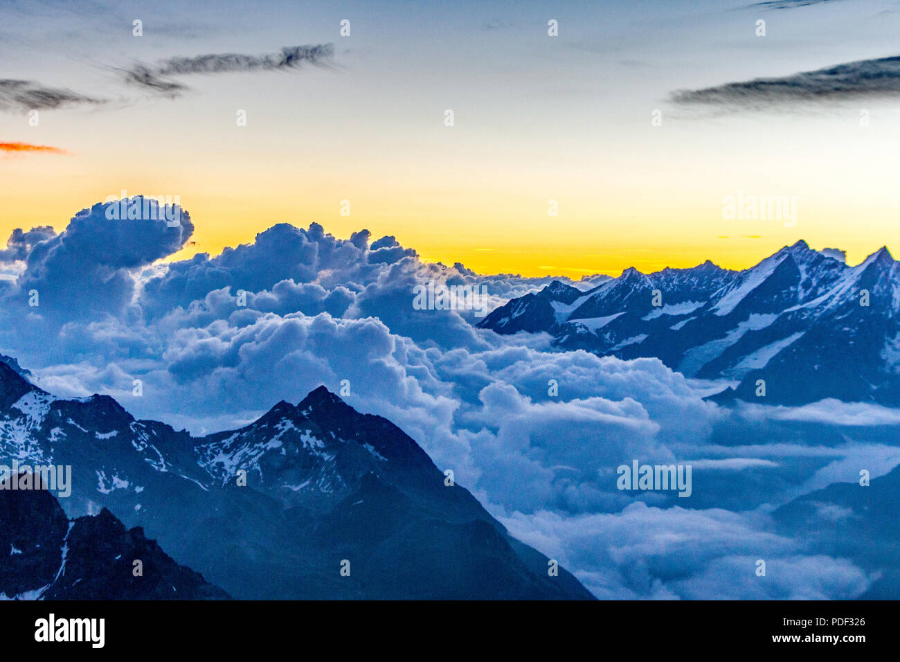 Mountain above clouds hi-res stock photography and images - Alamy