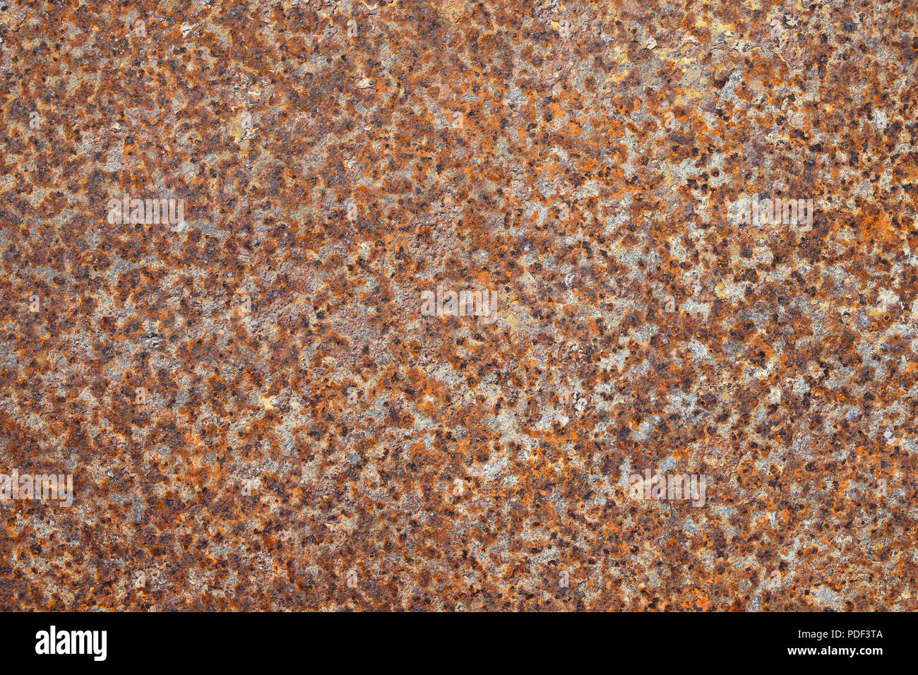 Old vintage bright rust stains of corroded surface over grey steel ...