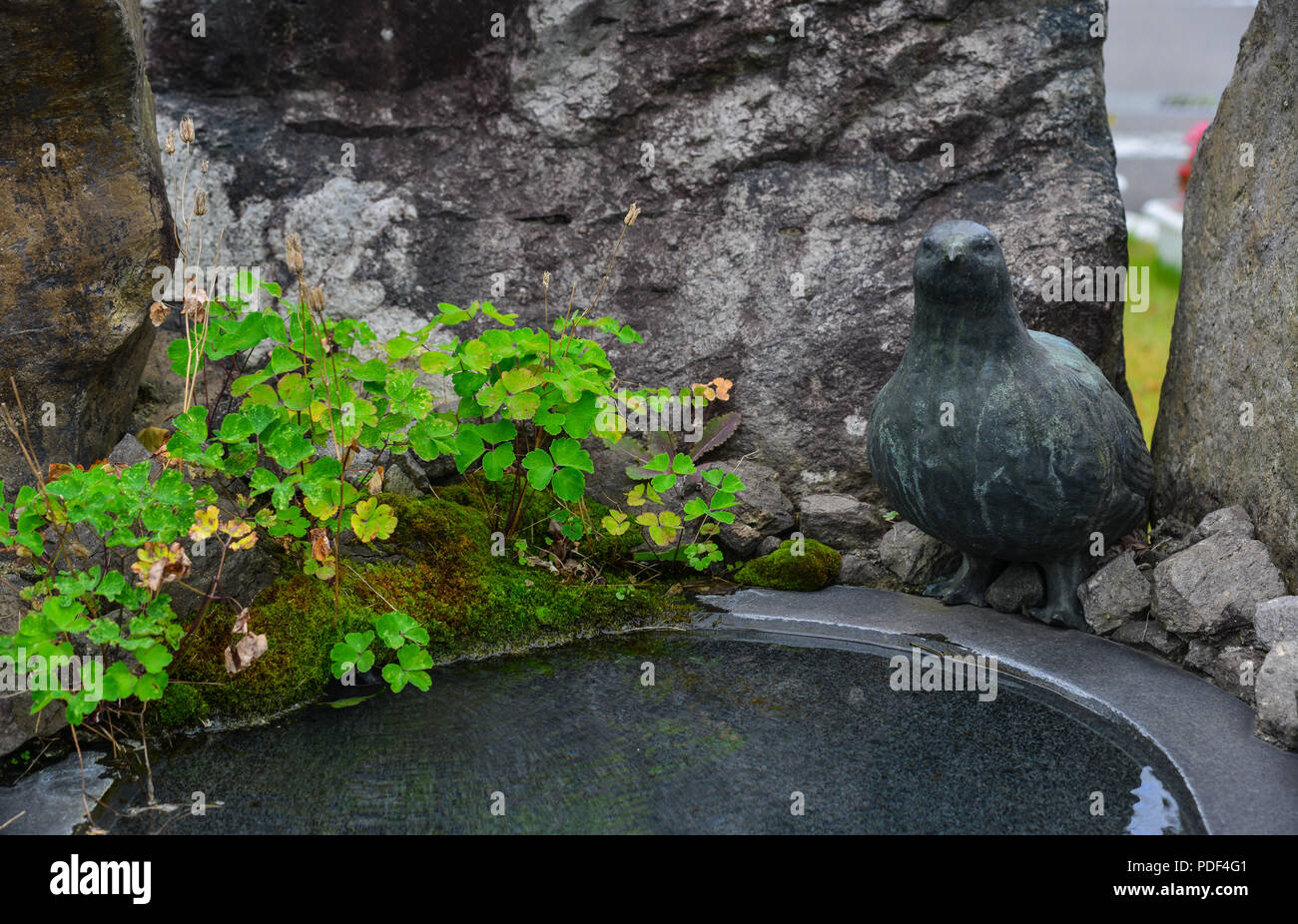 Bird statue with pond at Japanese garden in summer day Stock Photo - Alamy
