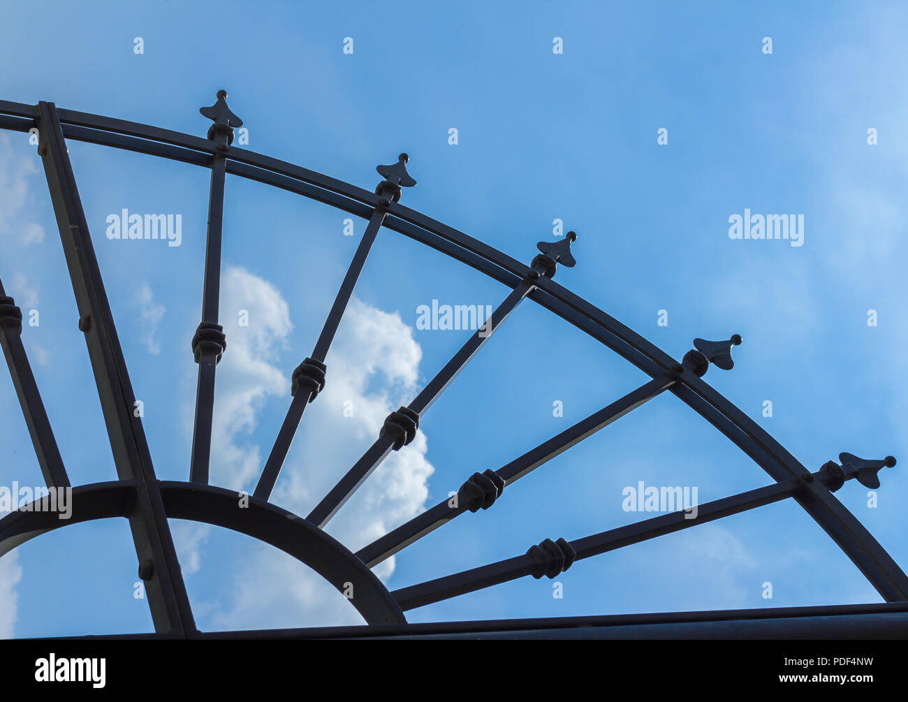 Fragment decorative of a wrought Iron gate. Space for text Stock Photo ...