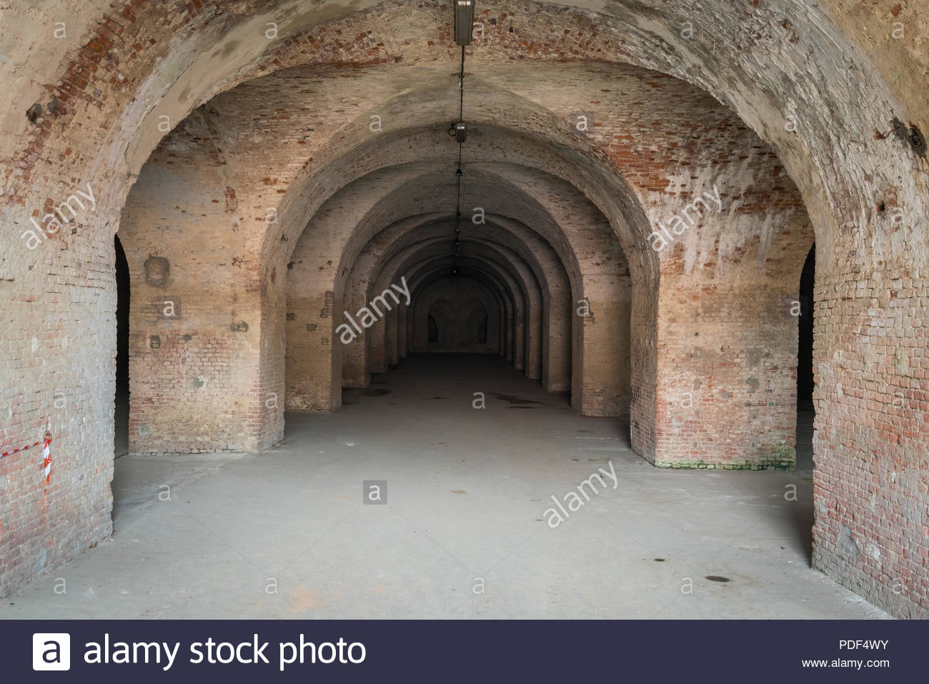 Decaying interior of an abandoned building with peeling paint and ...