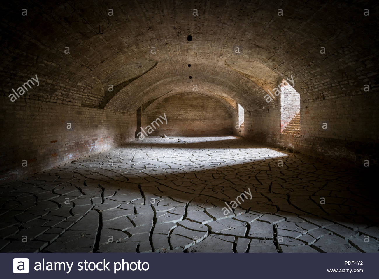 Decaying interior of an abandoned building with peeling paint and ...