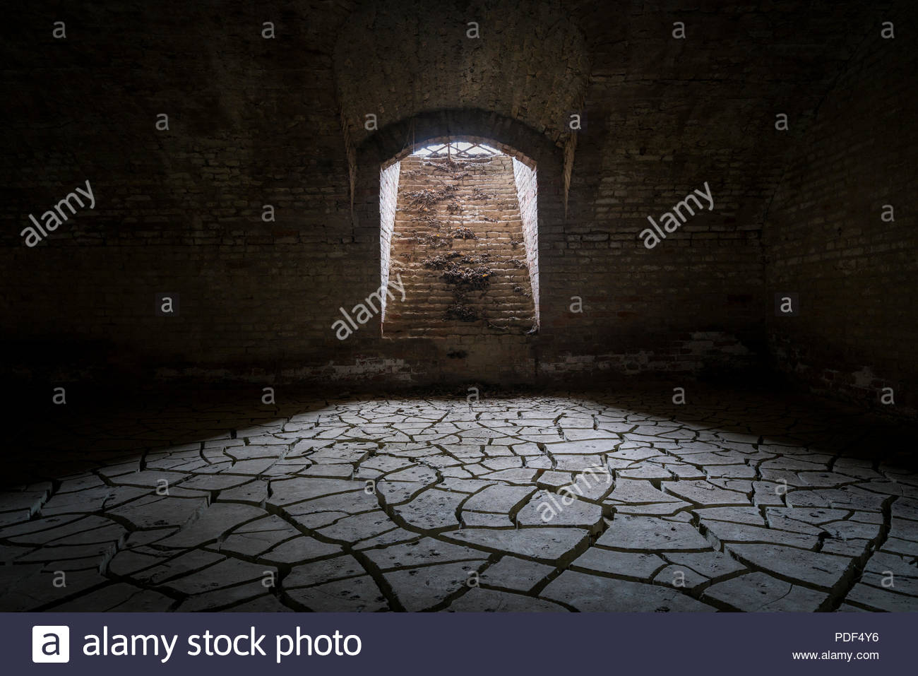 Decaying interior of an abandoned building with peeling paint and ...