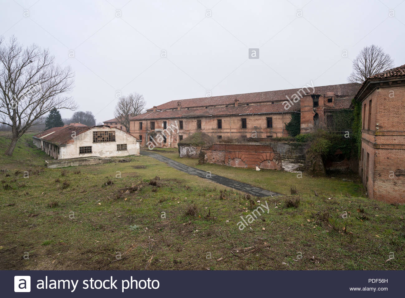 Decaying interior of an abandoned building with peeling paint and ...