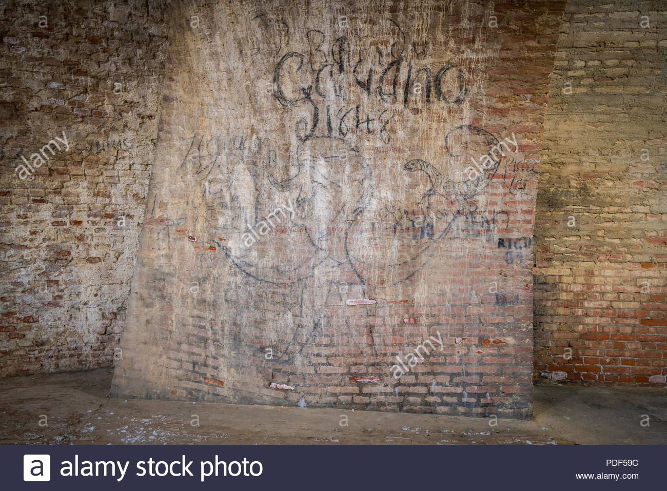 Decaying interior of an abandoned building with peeling paint and ...