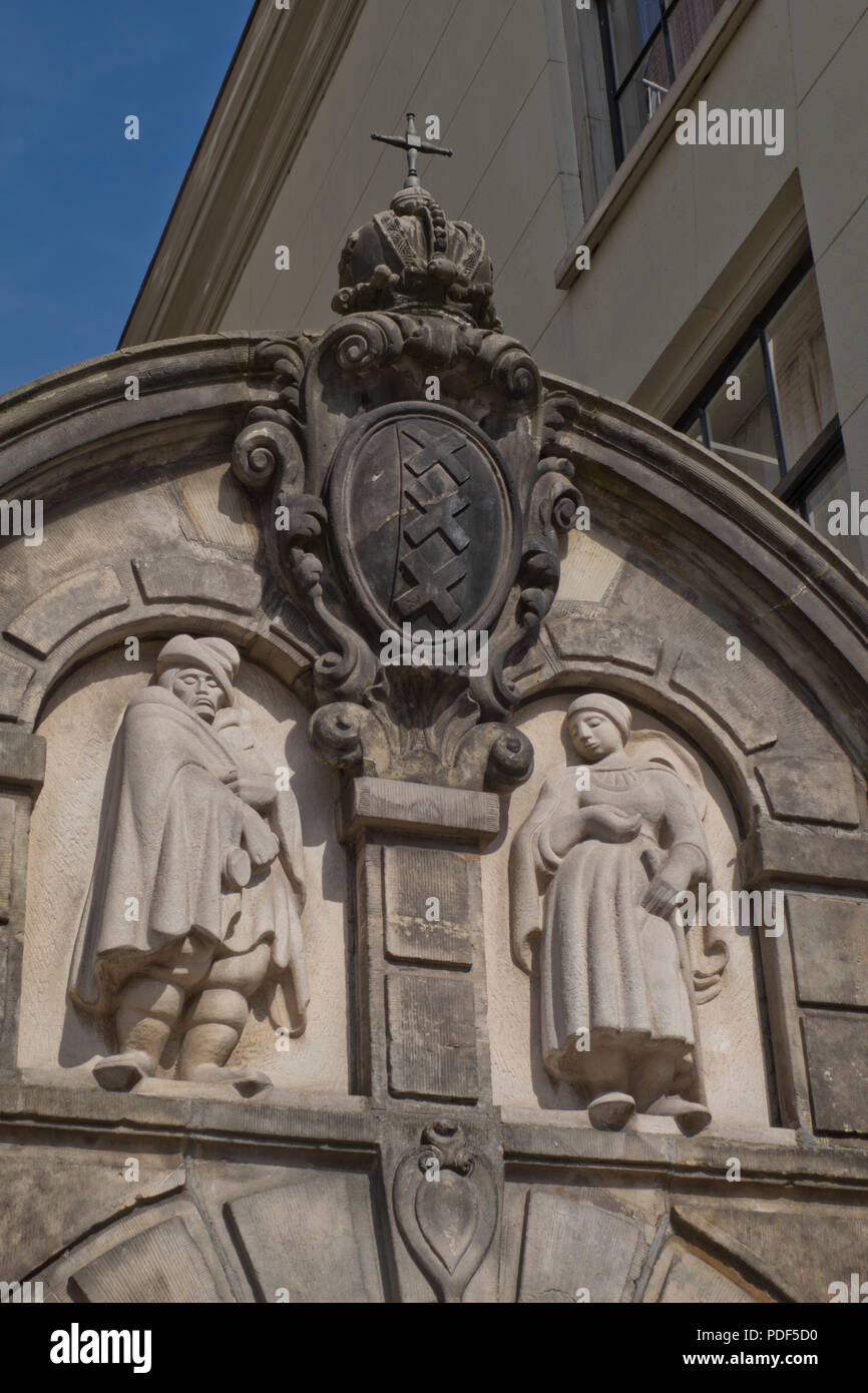 Aspect of typical Dutch church with statue in Amsterdam,Holland ...