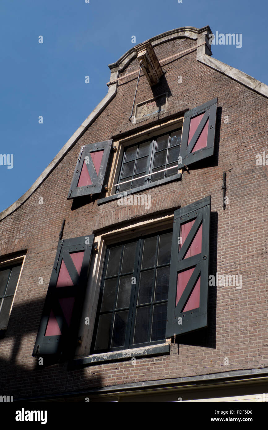 Typical Dutch gabled roof houses with hooks formerly used for elevating ...