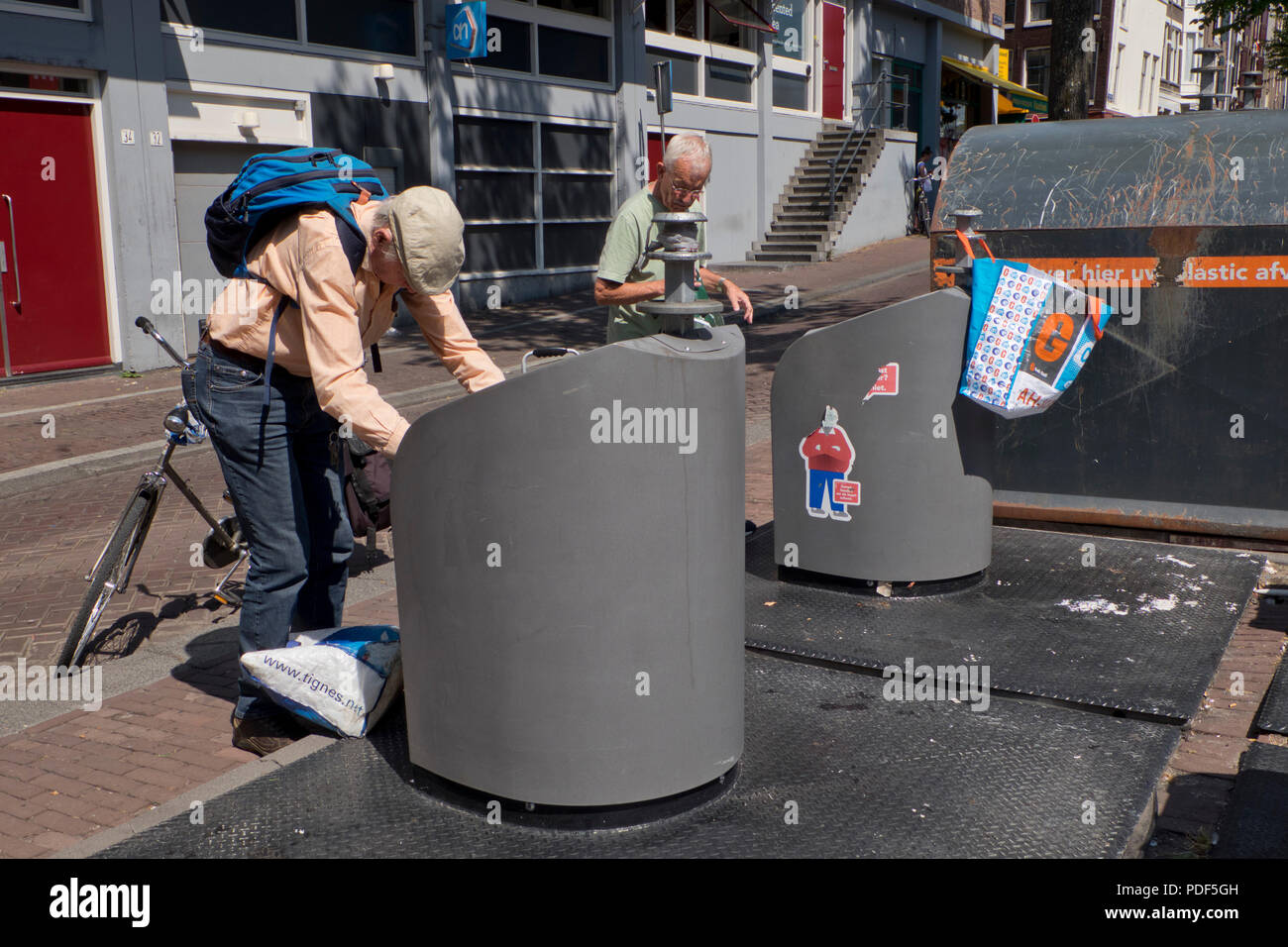 Senior citizens local residents recycling waste in designated ...