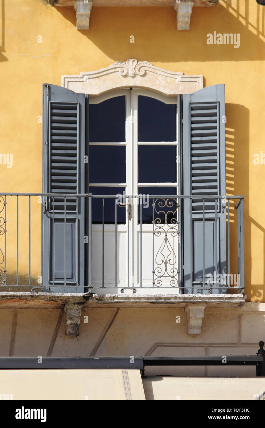 Colourful ancient squared window Stock Photo - Alamy