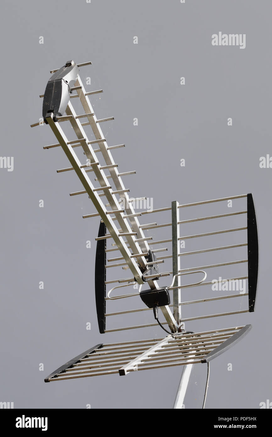 Television aerial against a clear sky background Stock Photo - Alamy