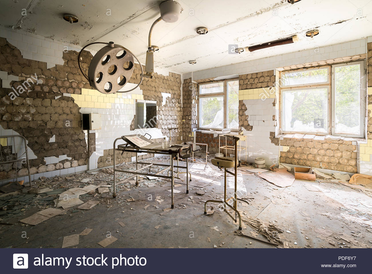 Decaying interior of an abandoned building with peeling paint and ...