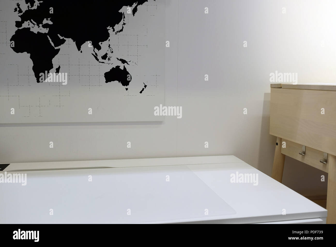 Modern furnished, study Desk and chair with a map of the world Stock ...