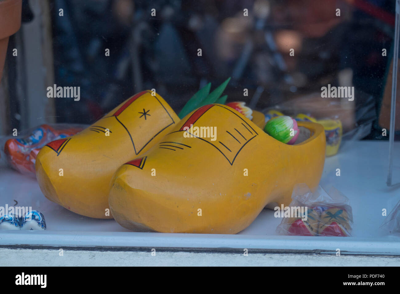 Traditional Dutch clogs shoes displayed in a shop window in Amsterdam ...