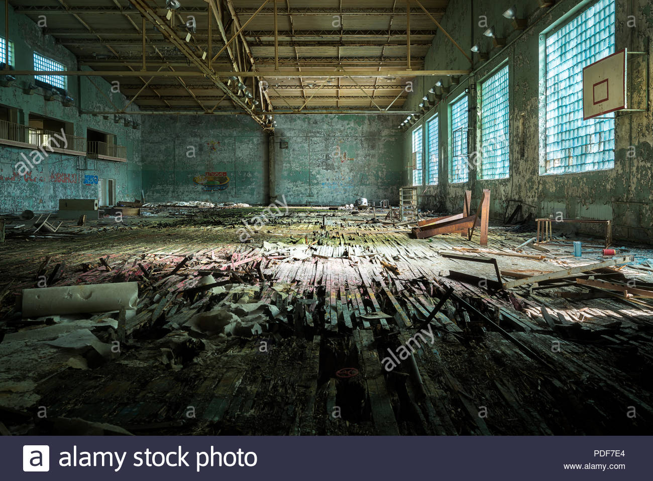 Decaying interior of an abandoned building with peeling paint and ...