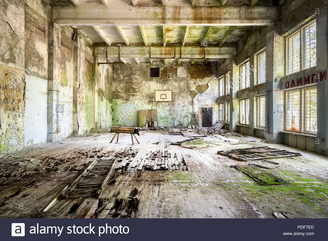Decaying interior of an abandoned building with peeling paint and ...