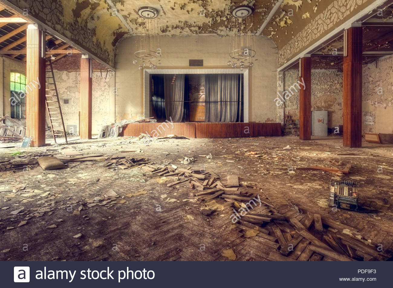 Decaying interior of an abandoned building with peeling paint and ...