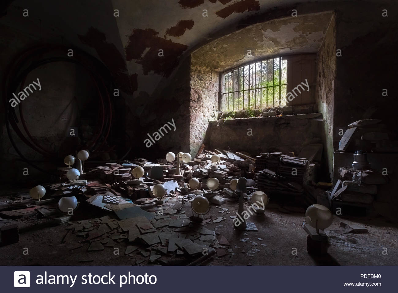 Decaying interior of an abandoned building with peeling paint and ...