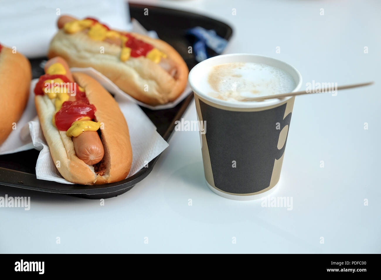 The-dogs, sauce, ketchup, coffee with milk in a Cup. Latte isolated on ...