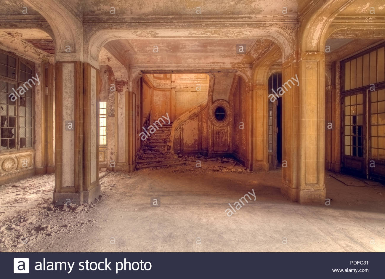 Decaying interior of an abandoned building with peeling paint and ...